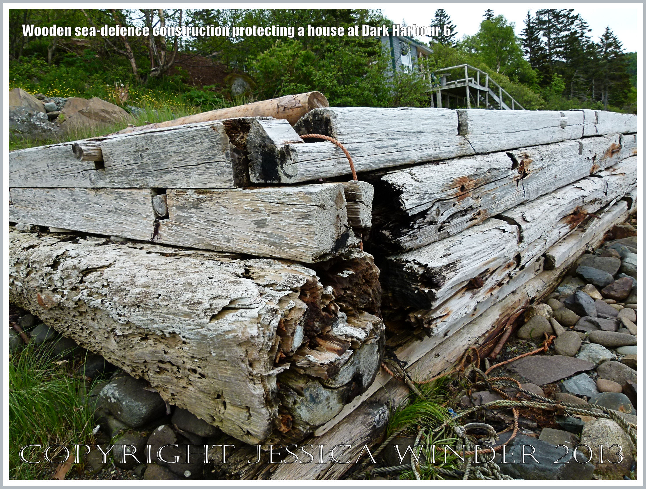 Wooden sea defence structure protecting a house at Dark Harbour 6 ...